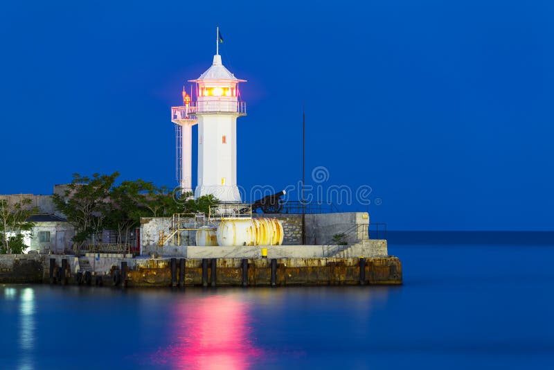 Lighthouse at night stock image. Image of building, nautical - 31455109