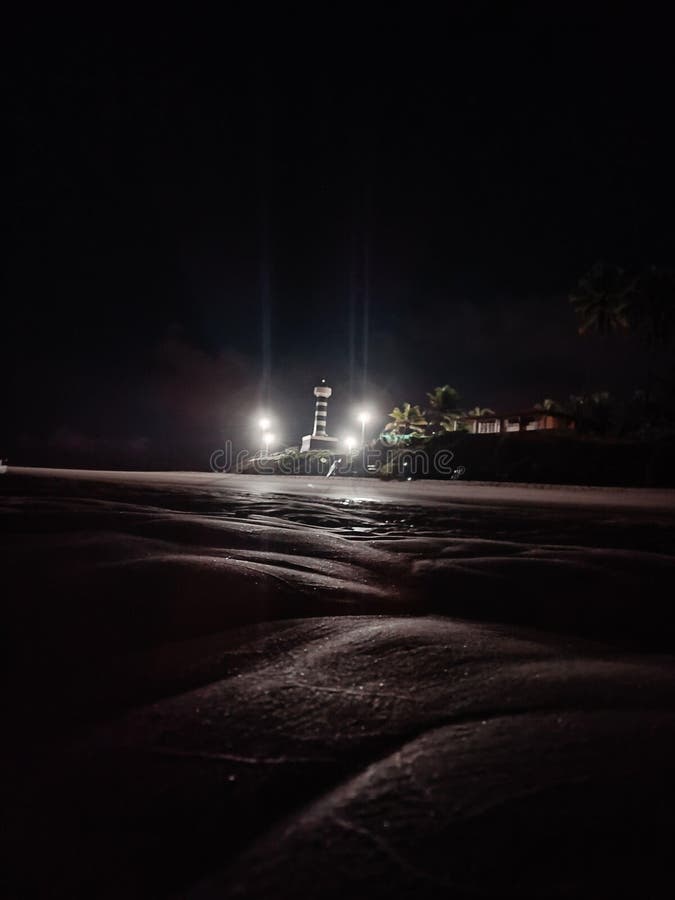 Lighthouse at night stock photo. Image of maritime, guiding - 361028906