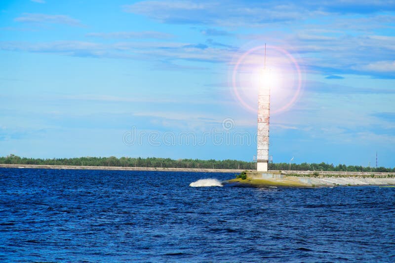 Lighthouse or Old Beacon Under Storm Clouds Stock Photo - Image of ...