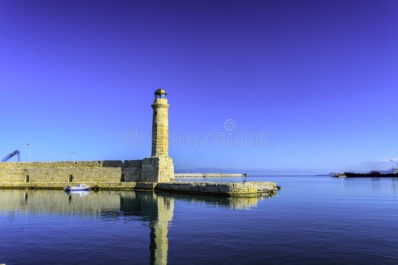 Lighthouse Rethymno Port stock photo. Image of harbor - 303780580