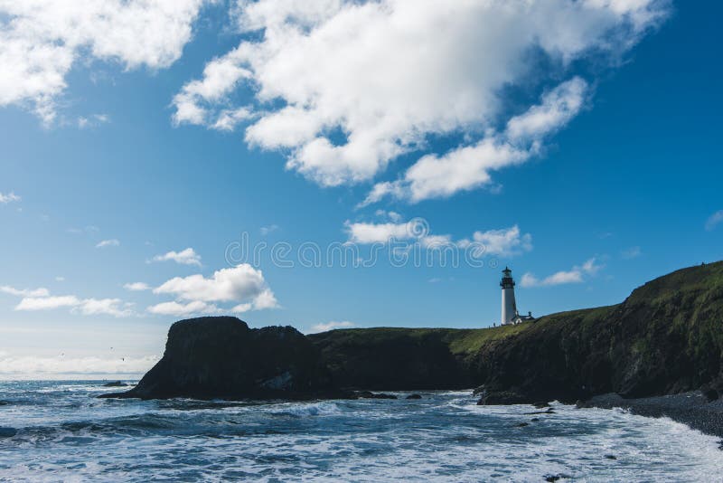 A Lighthouse Overlooking the Ocean. Stock Image - Image of open ...