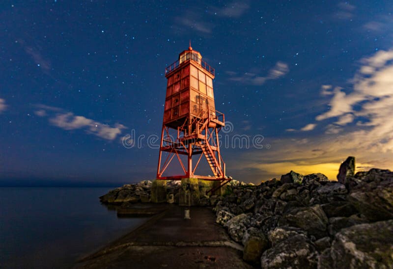 Break Water Lighthouse with Midnight Sky Stock Image - Image of marina ...