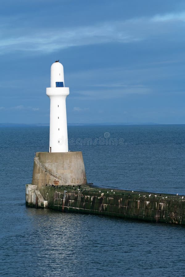 Lighthouse and pier stock image. Image of mooring, footdee - 13011191