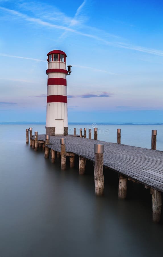Lighthouse and Ponds at the Lake Early in the Morning Stock Photo ...
