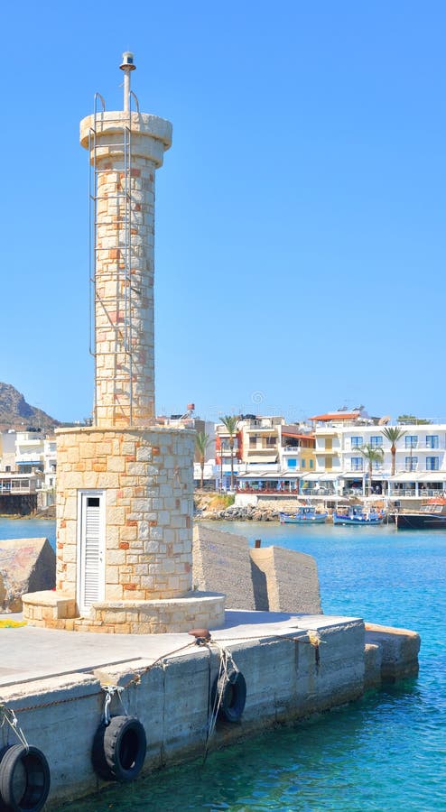 Lighthouse in the Port of Limenas Hersonissou. Stock Photo - Image of ...