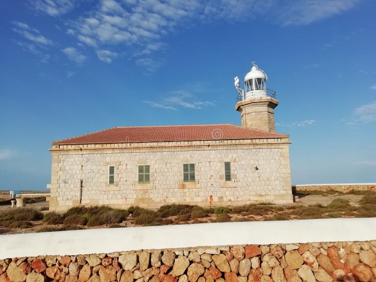 Lighthouse in Punta Nati stock photo. Image of nati - 150449782