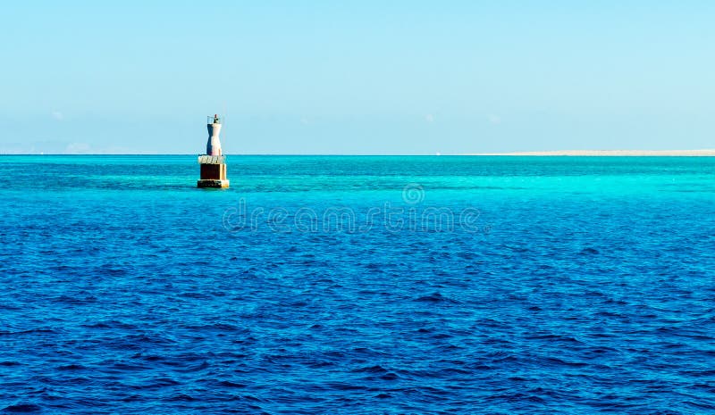 Lighthouse in the Red Sea stock photo. Image of desert - 48990122
