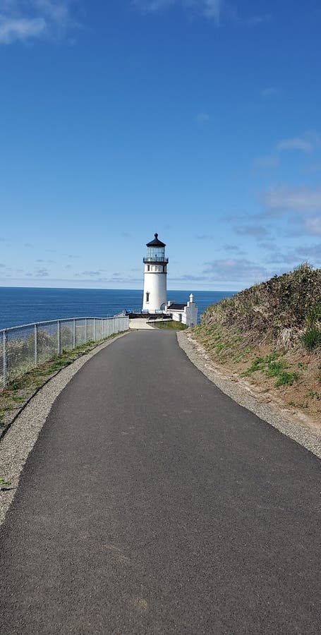 Lighthouse and Road,Calella,Spain Stock Photo - Image of cars, bright ...