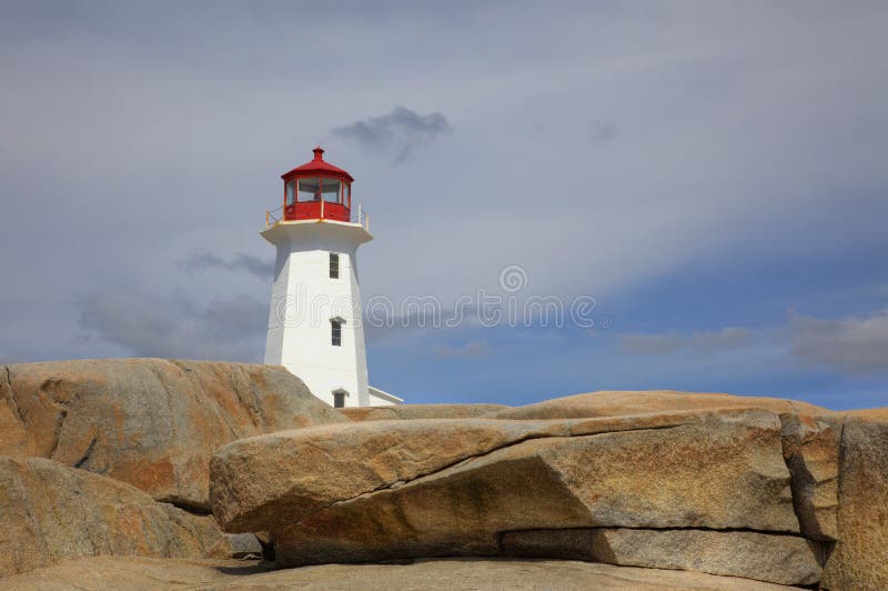Lighthouse by Ocean on Rocks Stock Image - Image of coastline, building ...