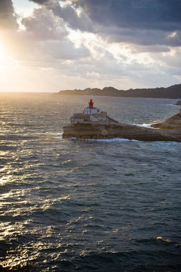 Lighthouse on Rocks Over the Sea Stock Photo - Image of corsica ...