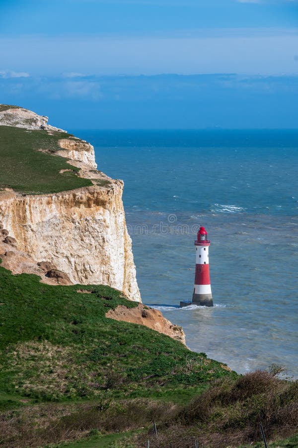 Lighthouse Sits Top Rocky Cliff Ocean Stock Photos - Free & Royalty ...