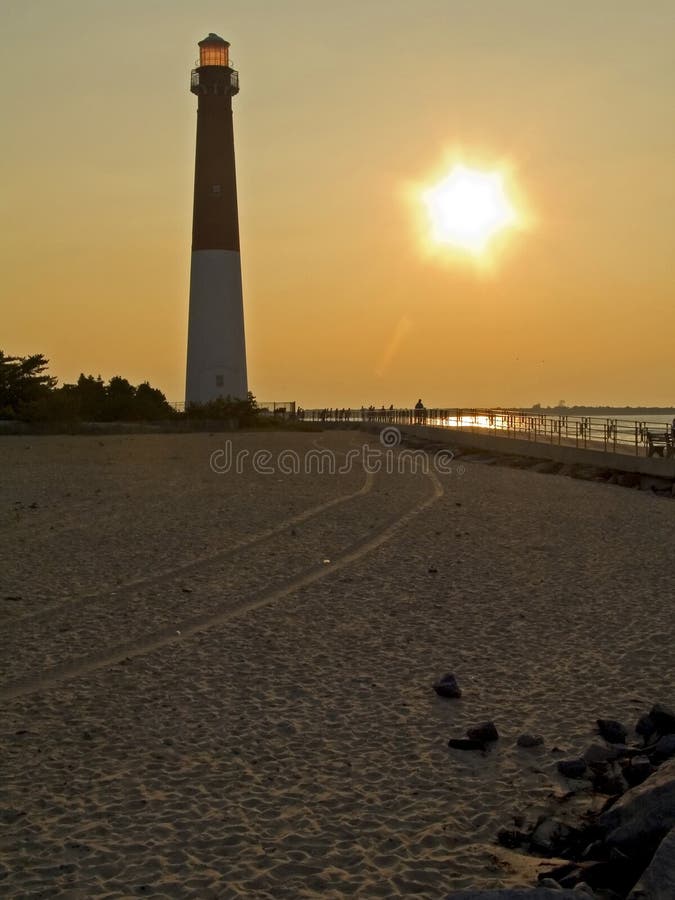 Lighthouse and Sand stock image. Image of tourist, sunset - 222949