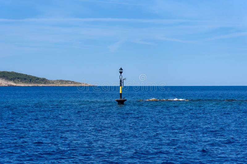 Lighthouse on Sea. Traffic Sign in the Sea Stock Photo - Image of ...