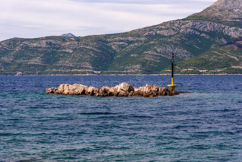 Lighthouse on Sea. Traffic Sign in the Sea Stock Photo - Image of ...
