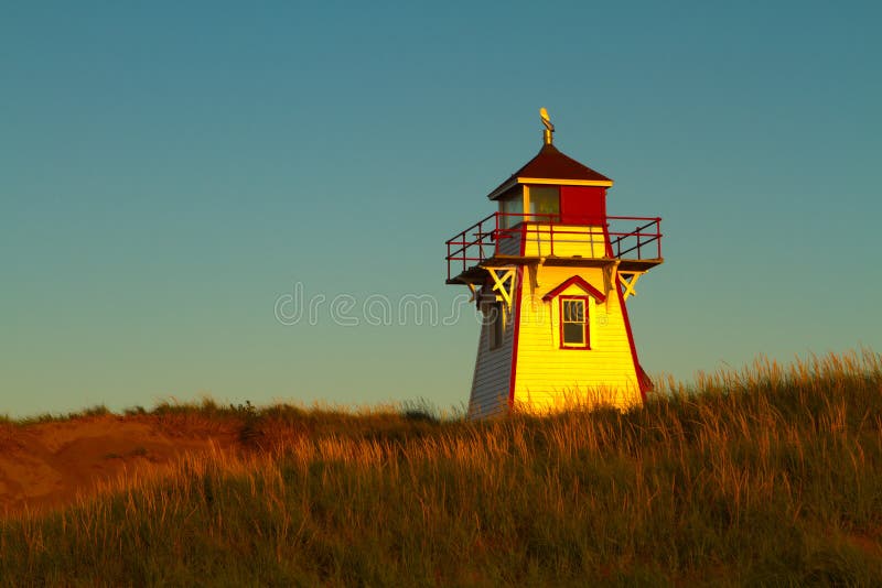 Lighthouse in Setting Sun stock photo. Image of island - 21763982