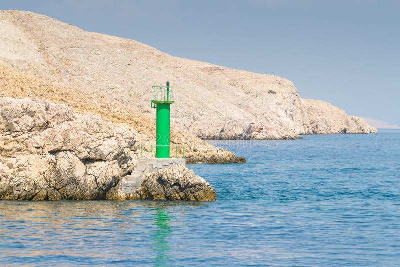 Lighthouse that Signals the Presence of Rocks at Ships. Stock Image ...