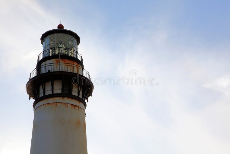 Lighthouse in the sky stock photo. Image of security - 12834408