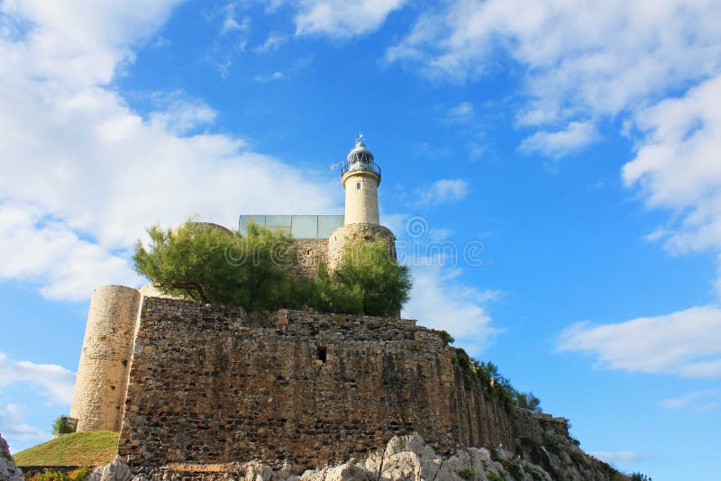 Lighthouse in Spain stock image. Image of grass, cantabria - 109311853