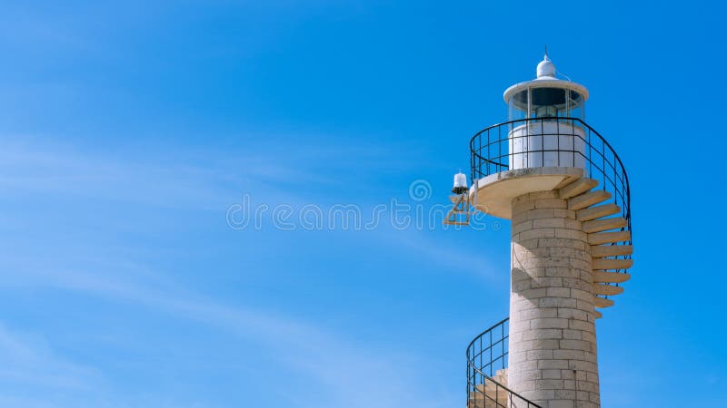 Lighthouse with Spiral Stairs on Bright Blue Sky Stock Photo - Image of ...
