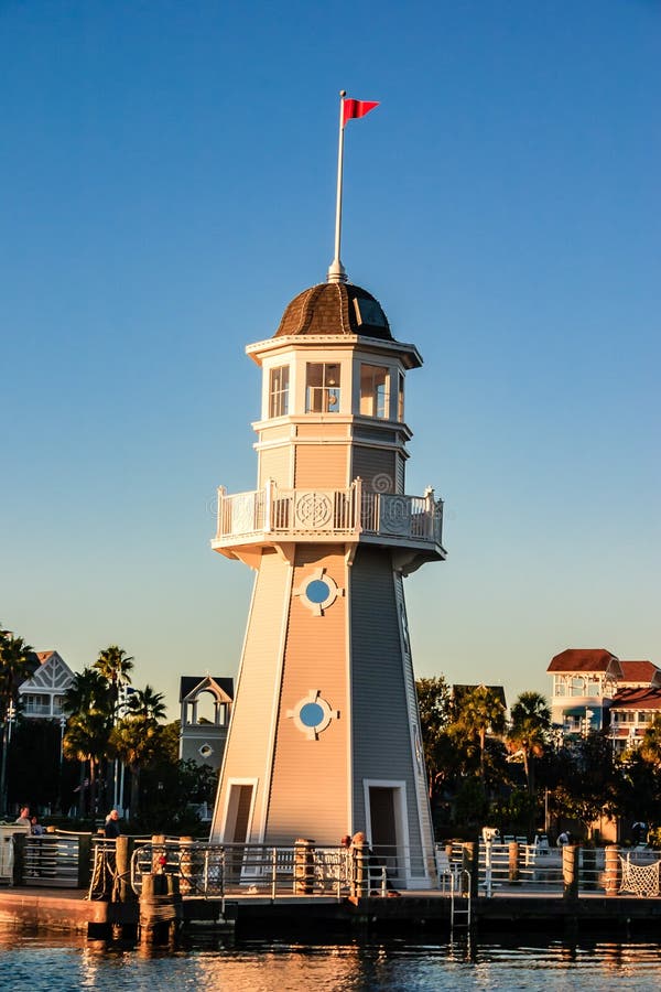A Lighthouse is Standing Tall on a Pier Stock Photo - Image of travel ...