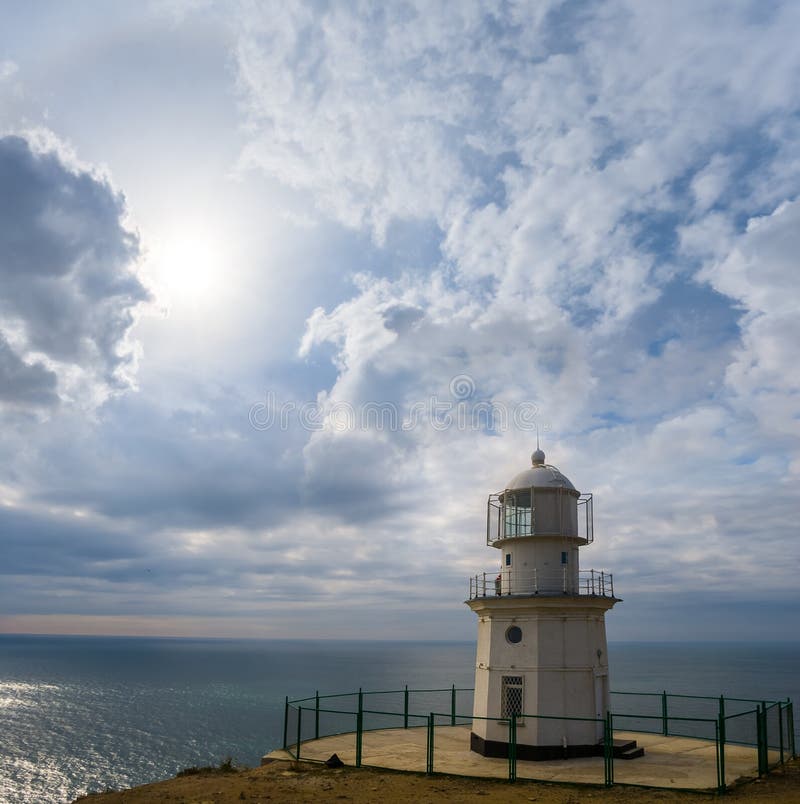 Lighthouse in a Marine Cape Stock Image - Image of safety, season: 9817191