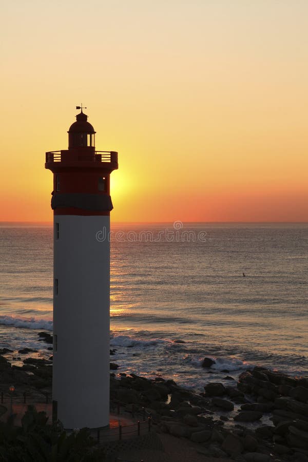 Lighthouse at sunrise stock image. Image of maritime - 25783835