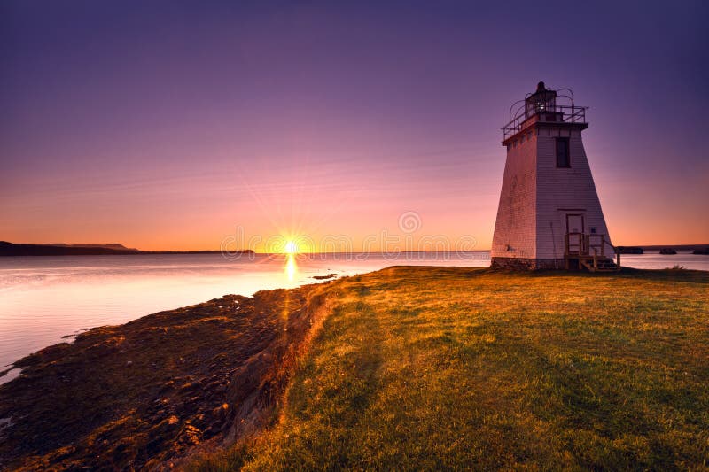 Lighthouse during Sunrise in the Early Morning Stock Image - Image of ...