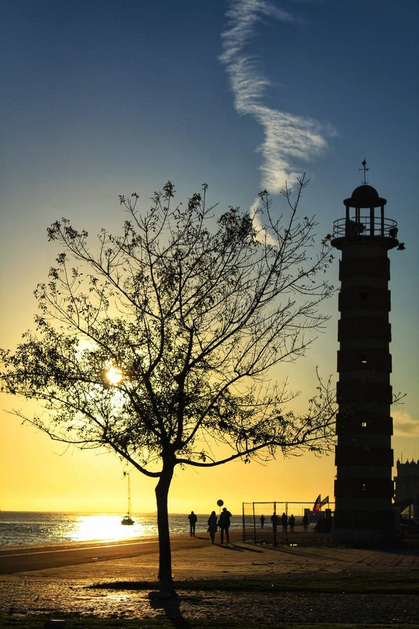 Lighthouse at Sunset Under Blue Sky in Lisbon Stock Photo - Image of ...