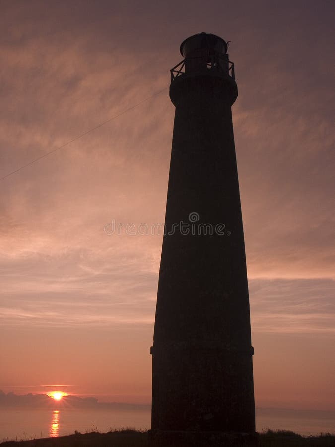 Lighthouse on Topy island stock image. Image of beacon - 577891