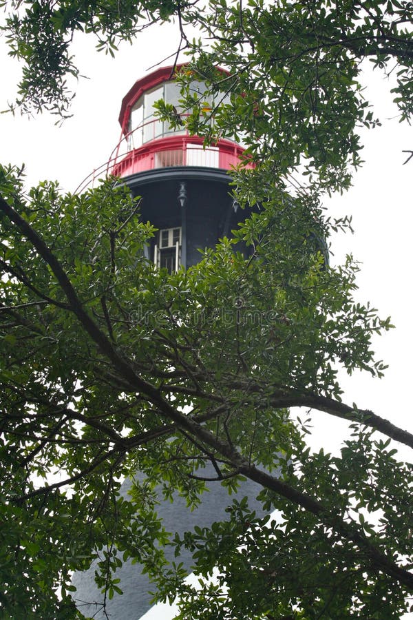 Lighthouse in the trees stock image. Image of scene, inside - 98537135