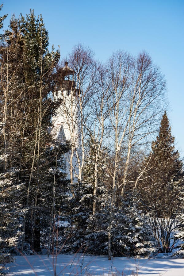 Lighthouse and trees stock photo. Image of experience - 88018762