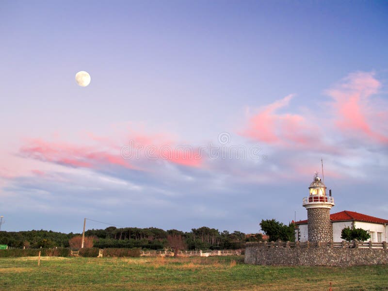 Lighthouse at twilight stock image. Image of getxo, twilight - 34649669