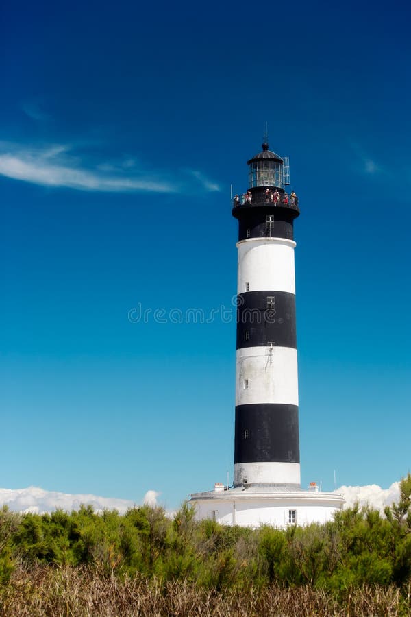 Lighthouse under blue sky stock image. Image of navigation - 7392071