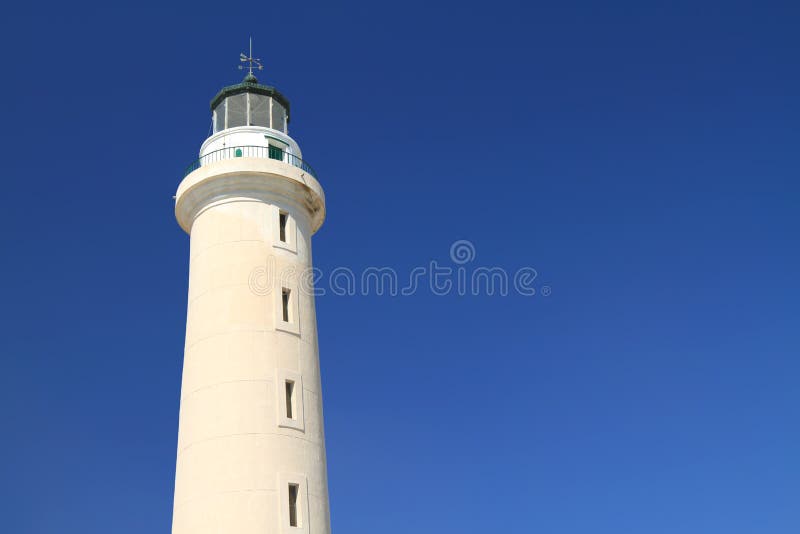 Lighthouse Under Bright Blue Sky Stock Image - Image of guidance, lamp ...