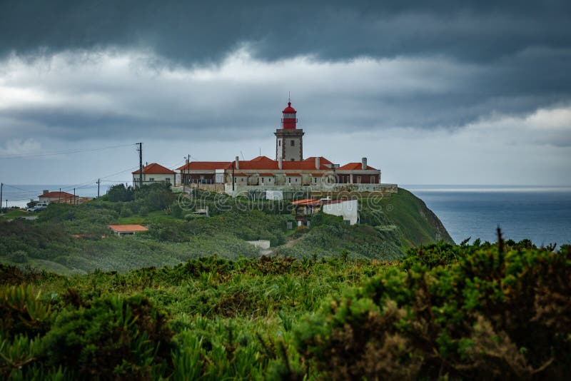 Lighthouse under the storm stock image. Image of navigation - 120014933
