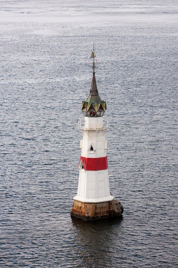 Lighthouse on the water stock image. Image of architecture - 90264143