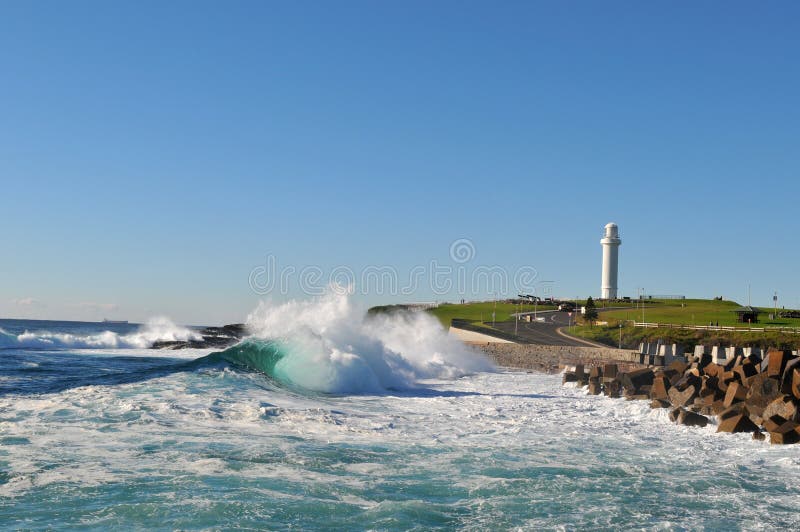 Lighthouse with waves stock photo. Image of blue, spray - 24643104