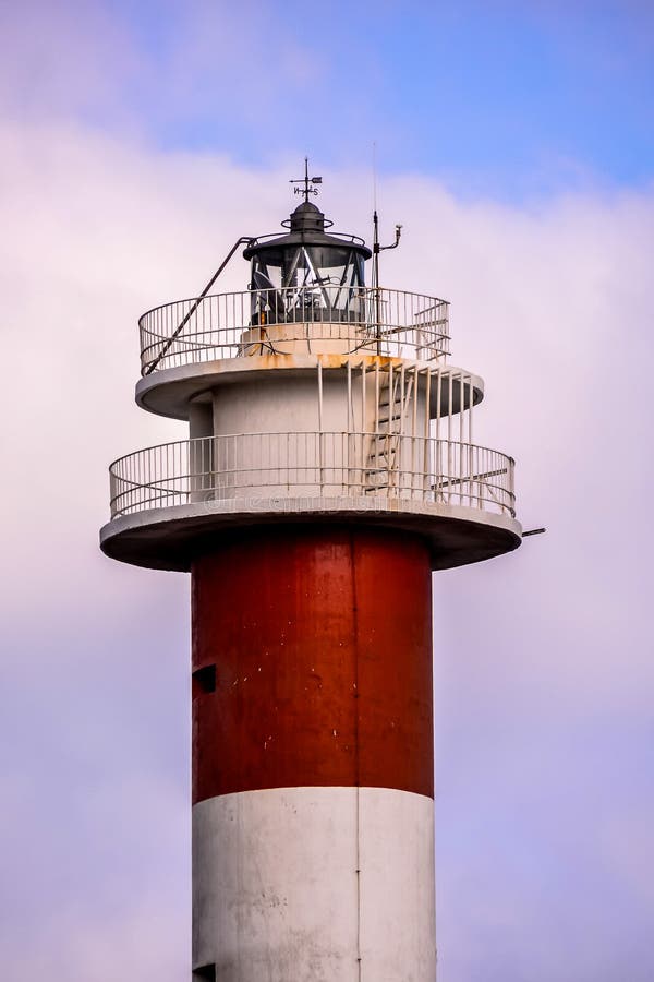 A Lighthouse with a White and Red Base Stock Photo - Image of vane ...
