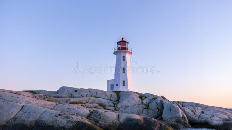 The Lighthouse is White with a Reddish-brown Top Section. it Stands ...
