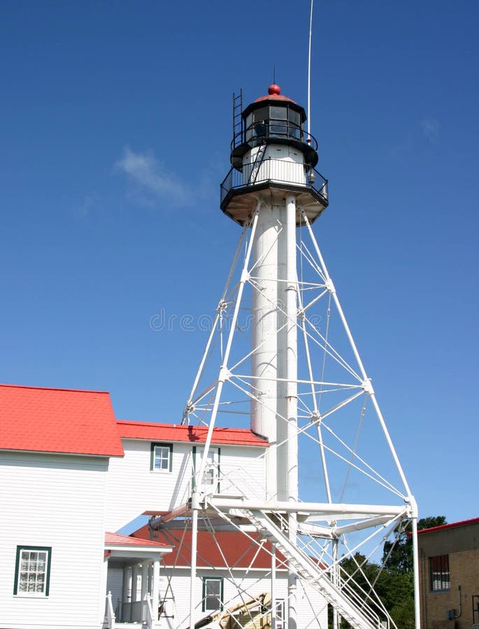 The Lighthouse at Whitefish Point Stock Photo - Image of beam, caution ...