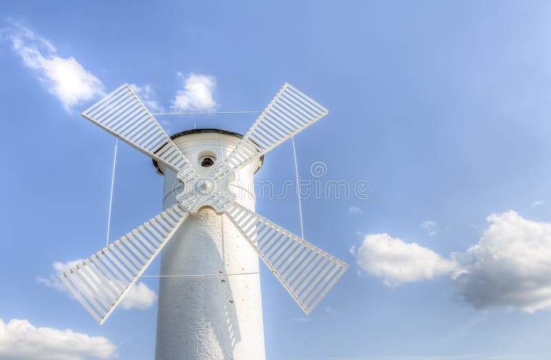 Lighthouse windmill stock photo. Image of maritime, europe - 58581746