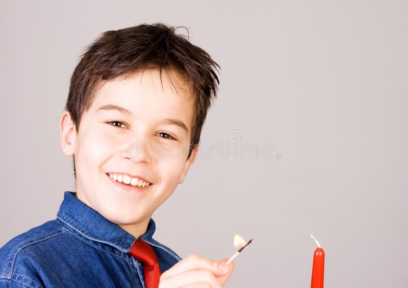 Lighting a candle stock image. Image of teens, expression - 12950731