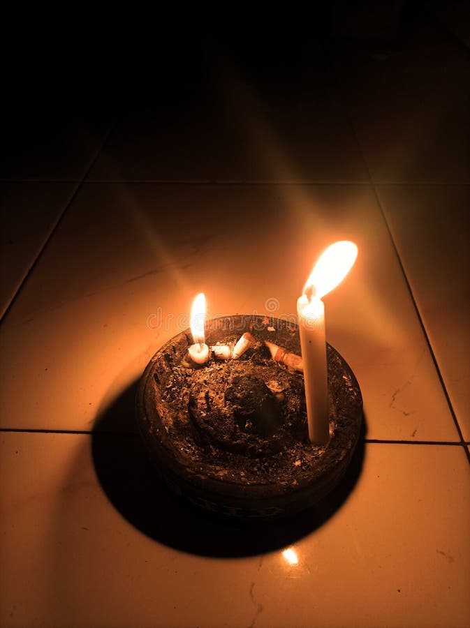 Lighting Candles at night stock photo. Image of organ - 271957732