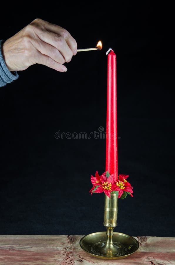 Lighting a Christmas Candle Stock Photo - Image of matchstick ...