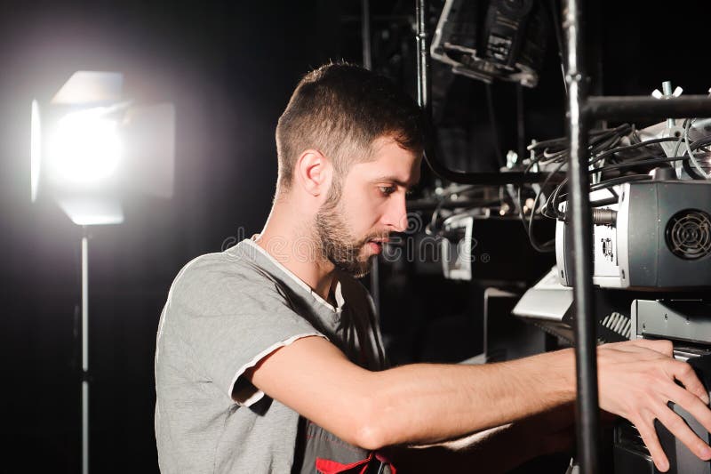 The Lighting Engineer Adjusts the Lights on the Stage Stock Image ...