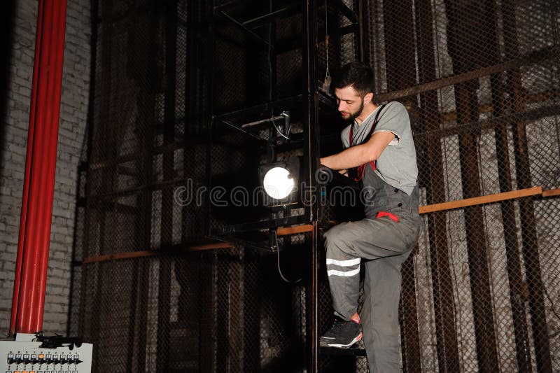 The Lighting Engineer Adjusts the Lights on Stage Stock Image - Image ...