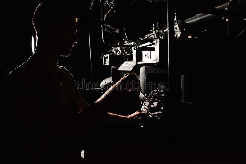 The Lighting Engineer Repairs the Light Device on Stage Stock Photo ...