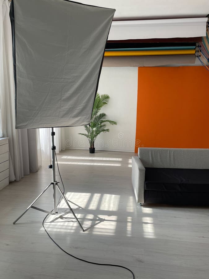 Lighting Equipment and Photographer Backgrounds in a Photo Studio Stock ...