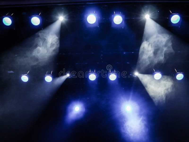 Lighting Equipment on the Stage. the Spotlight through the Smoke ...