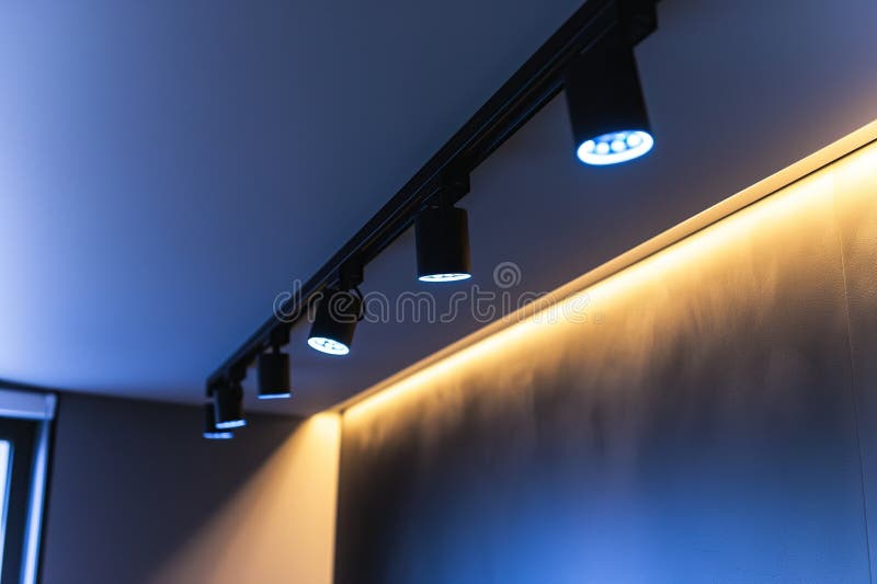 Lighting Equipment on the Wall in the Living Room. Spotlights Under the ...